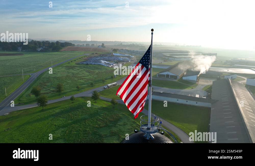 American flag waving at mega farm in the United States of America Stock ...