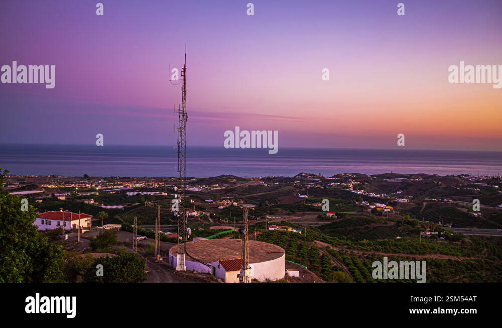 Pink yellow orange gradient sky above Strait of Gibraltar, view from ...