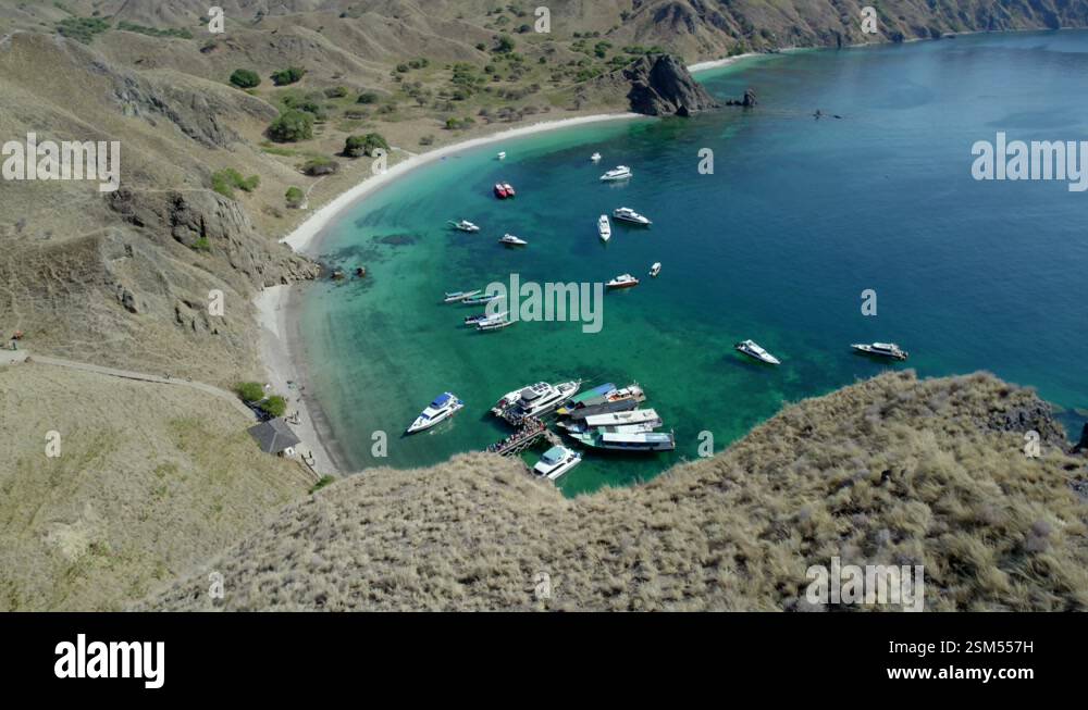 Komodo aerial of the beach and reef on a hot sunny day Stock Video ...