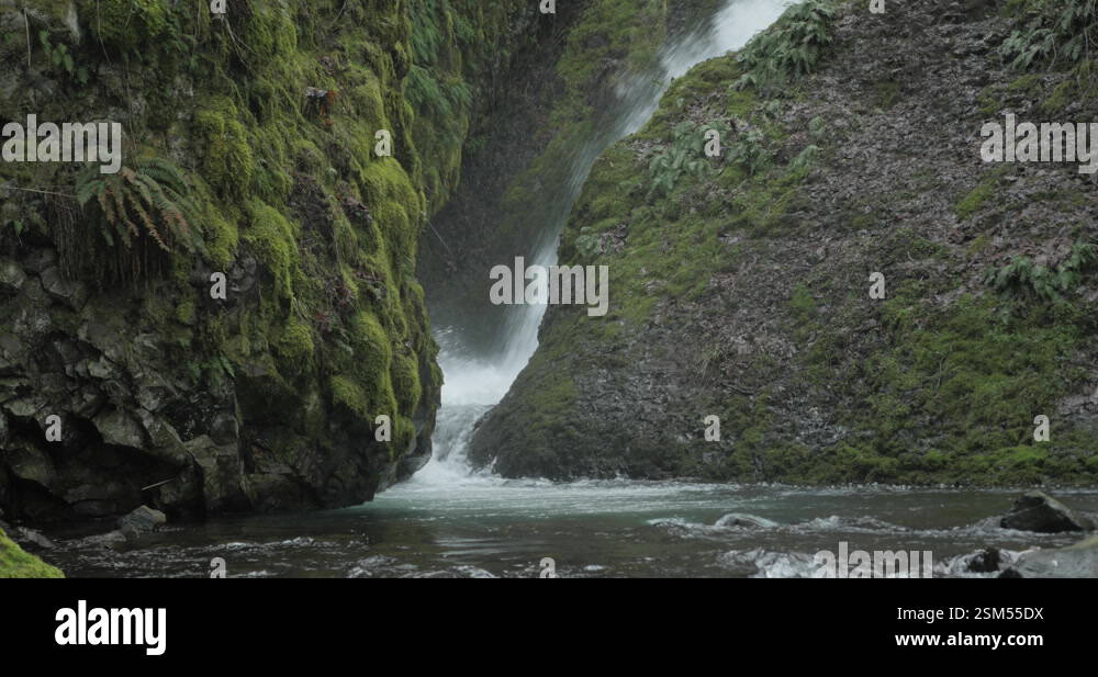 Boulders at the base of a waterfall Stock Video Footage - Alamy