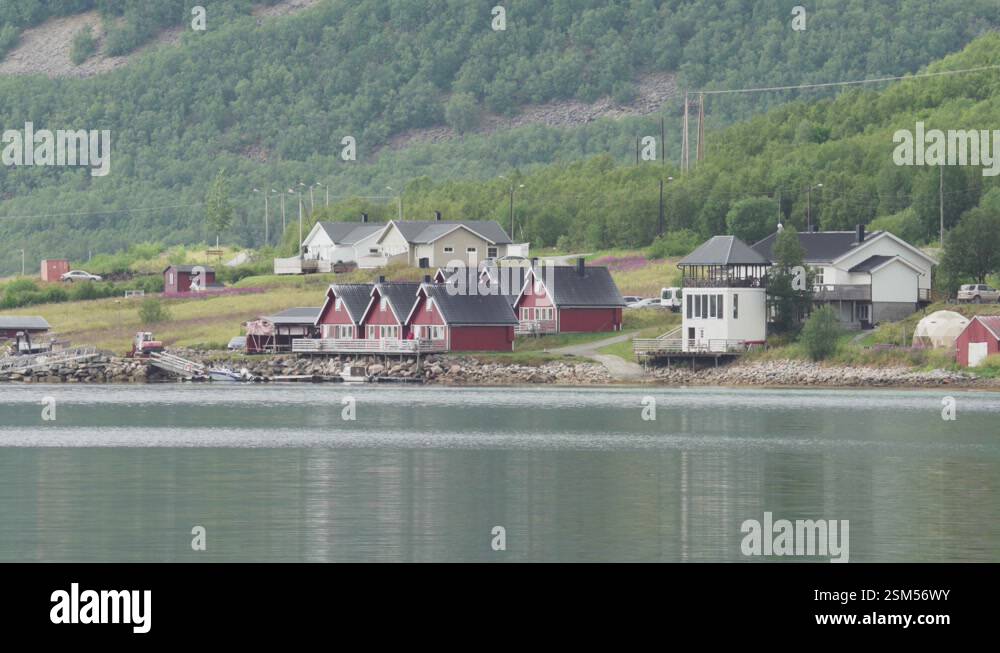 A Picturesque Vista of Houses by the Water's Edge in Medby, Senja ...