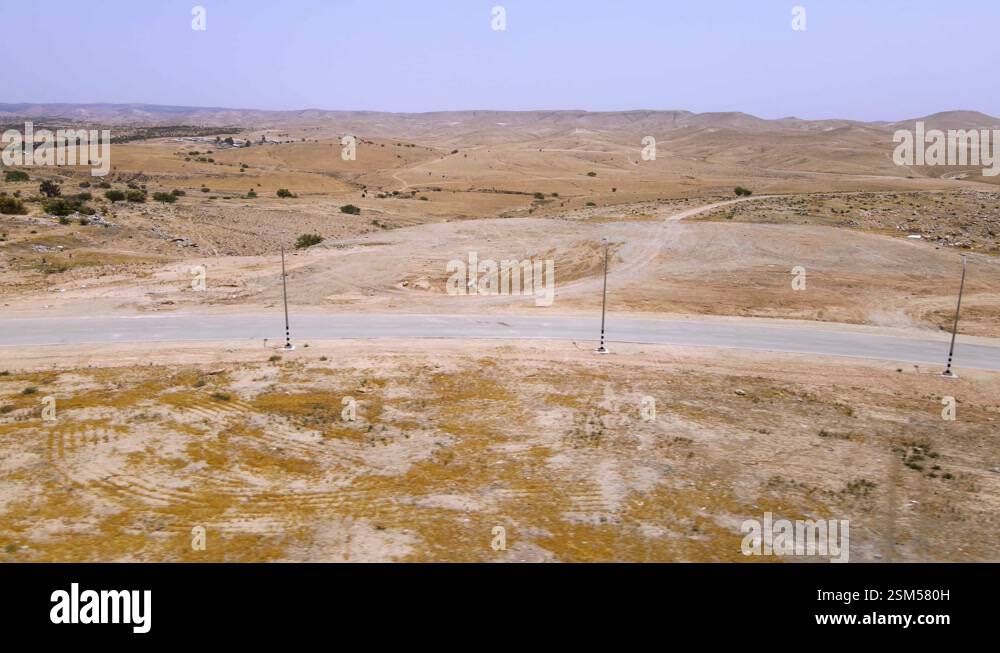 A road in the middle of the desert in the Negev, southern Israel Brown Stock Video Footage - Alamy