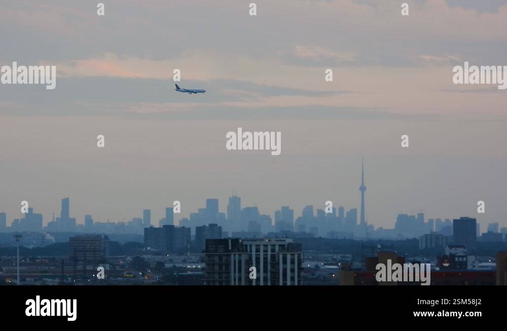 An Airplane On Flight Below Dramatic Sky With Stunning City Skyline Of ...