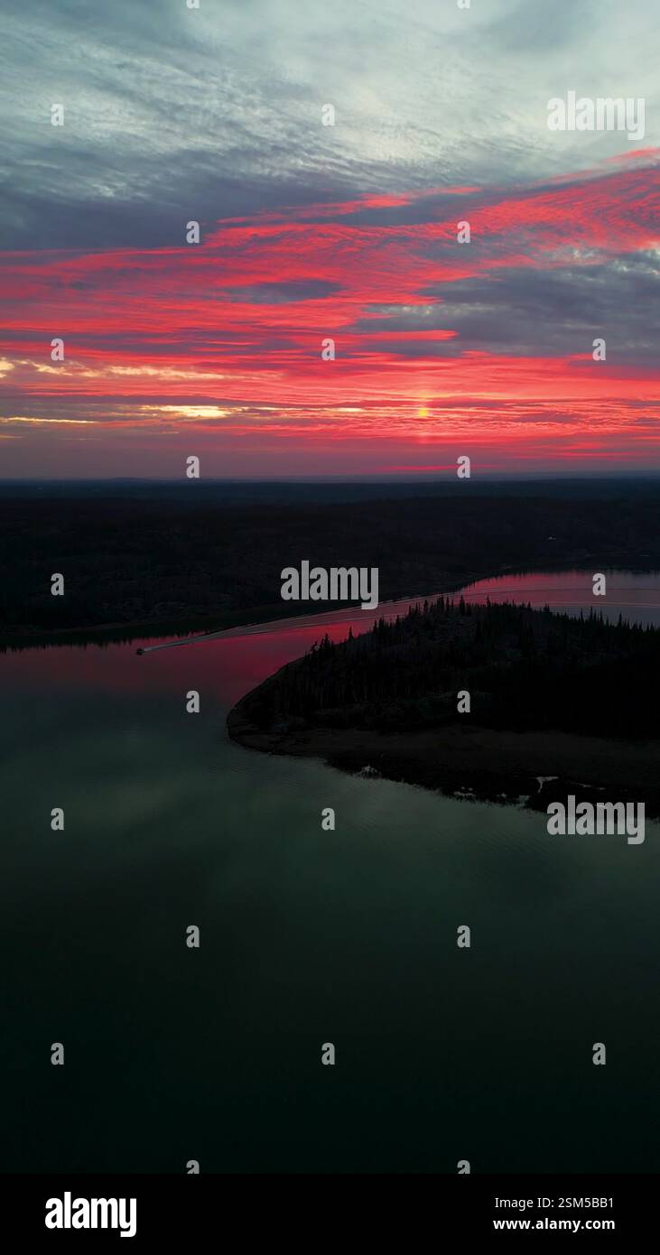 Boat driving on mirror lake during sunset Stock Video Footage - Alamy
