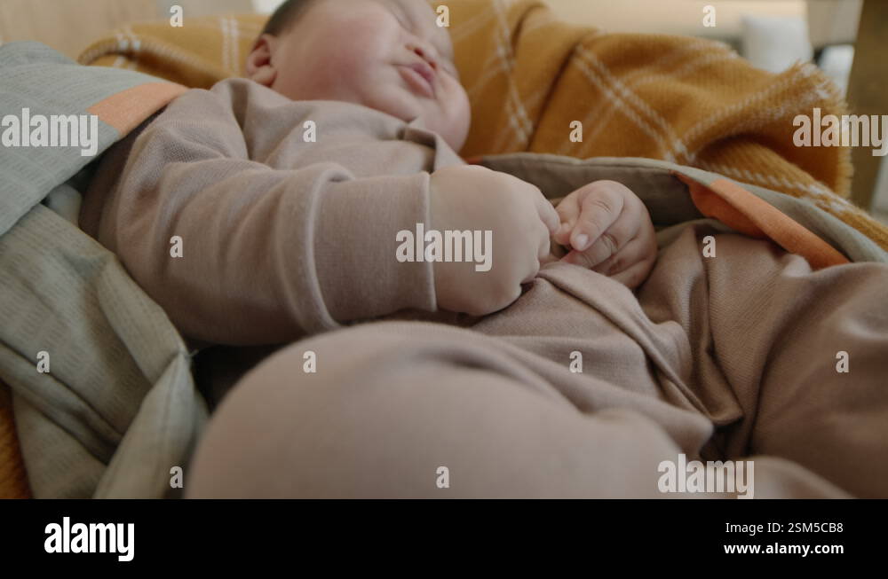 Baby Boy Crying in Rocker Stock Video Footage - Alamy