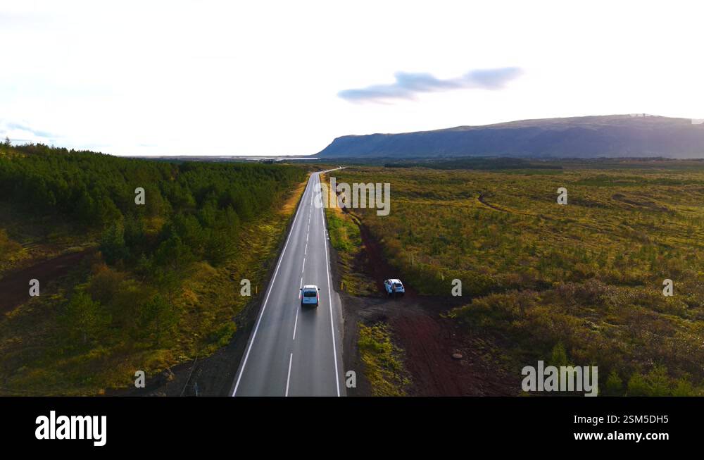 Traveling drone of a huge road in the vastness of Iceland's landscapes ...