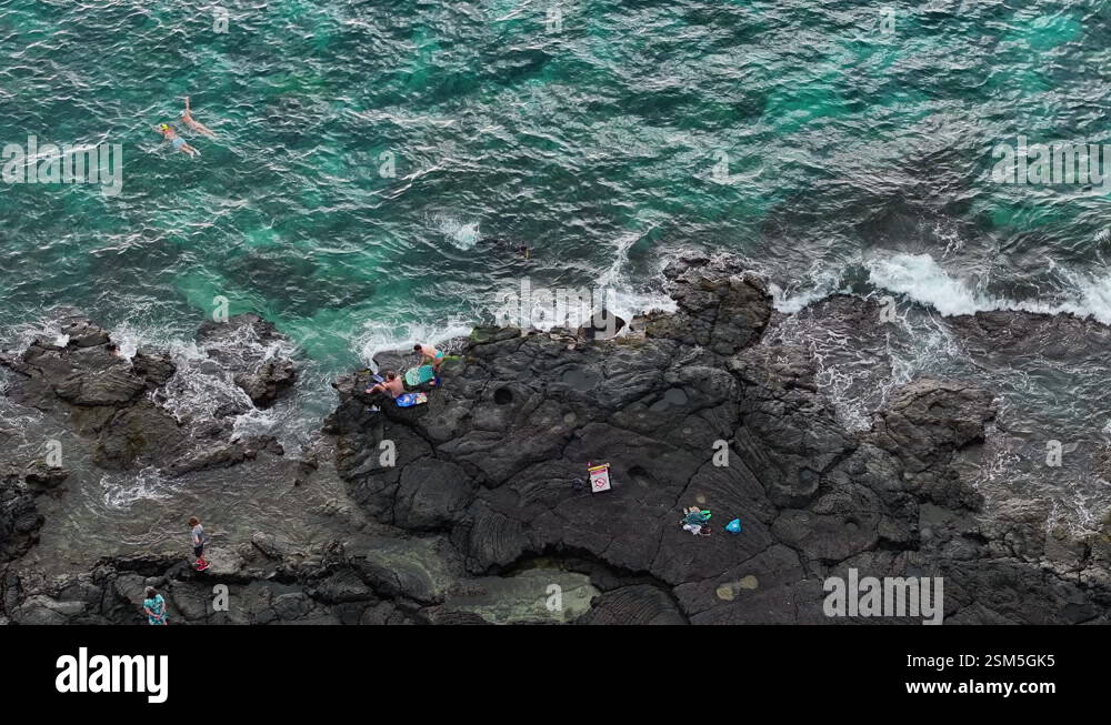Aerial ocean Two Step beach swimmers Kona Hawaii overhead 4K Stock ...