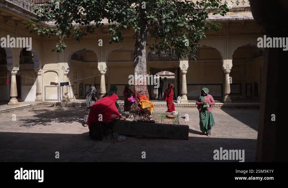 Indian pilgrims making offerings in Galtaji temple, Rajasthan, Jaipur ...
