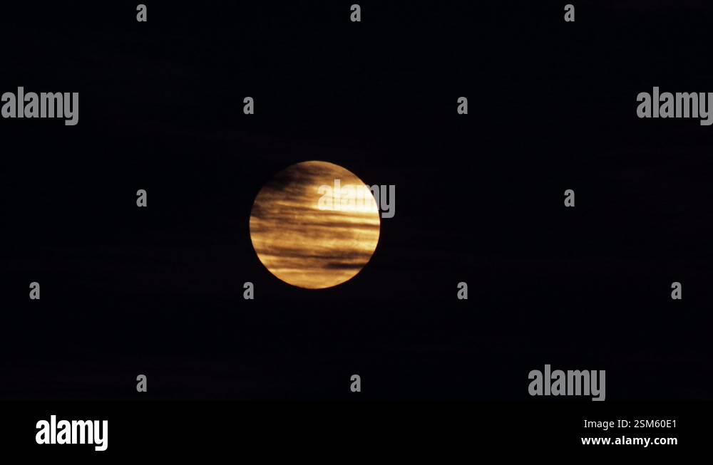 Full Harvest Moon Moon Behind Clouds. Medium Shot Night Time Upper ...