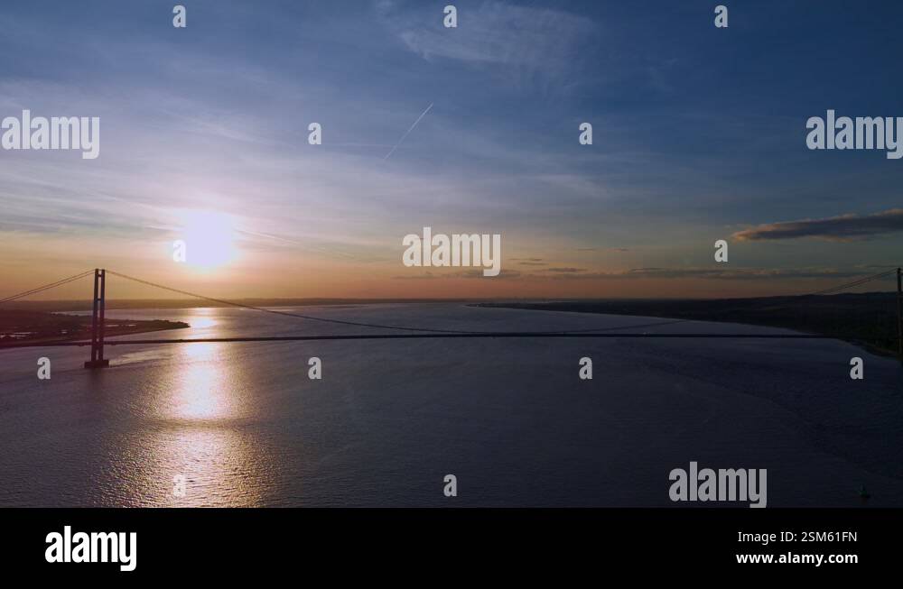 Twilight magic: Humber Bridge, cars weaving their path in an aerial ...