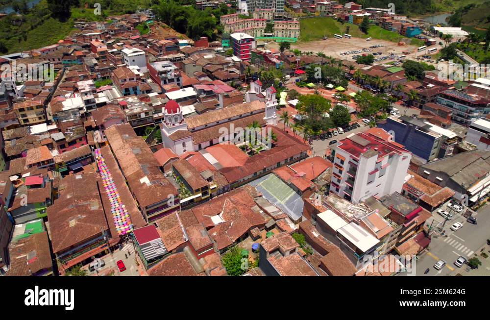Picturesque Colombian village of Guatapé and famous rock in background ...