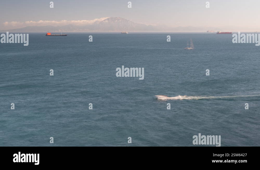 Many ships and boats moving near coast of Spain, time lapse view Stock ...