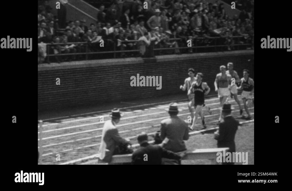 1940s: People run track in stadium. People running the track around ...