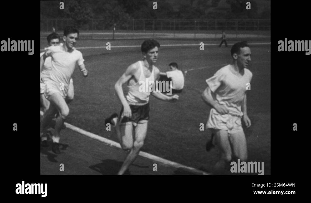 1940s: Group of people run on track. Back of man running on track Stock ...