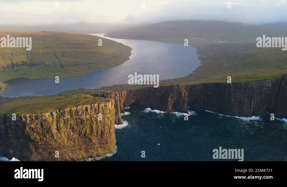 Far range drone footage of the Leitisvatn Lake, aka the Floating Lake ...