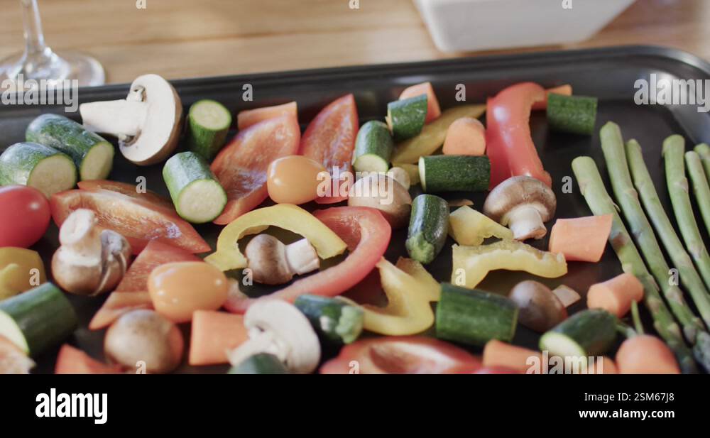 General view of kitchen countertop and chopped up vegetables with copy ...