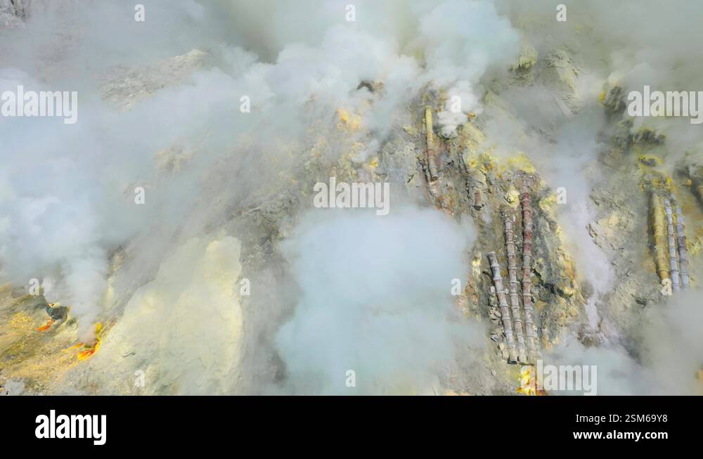 Toxic volcanic gas at the sulphur mines in the crater of the active ...