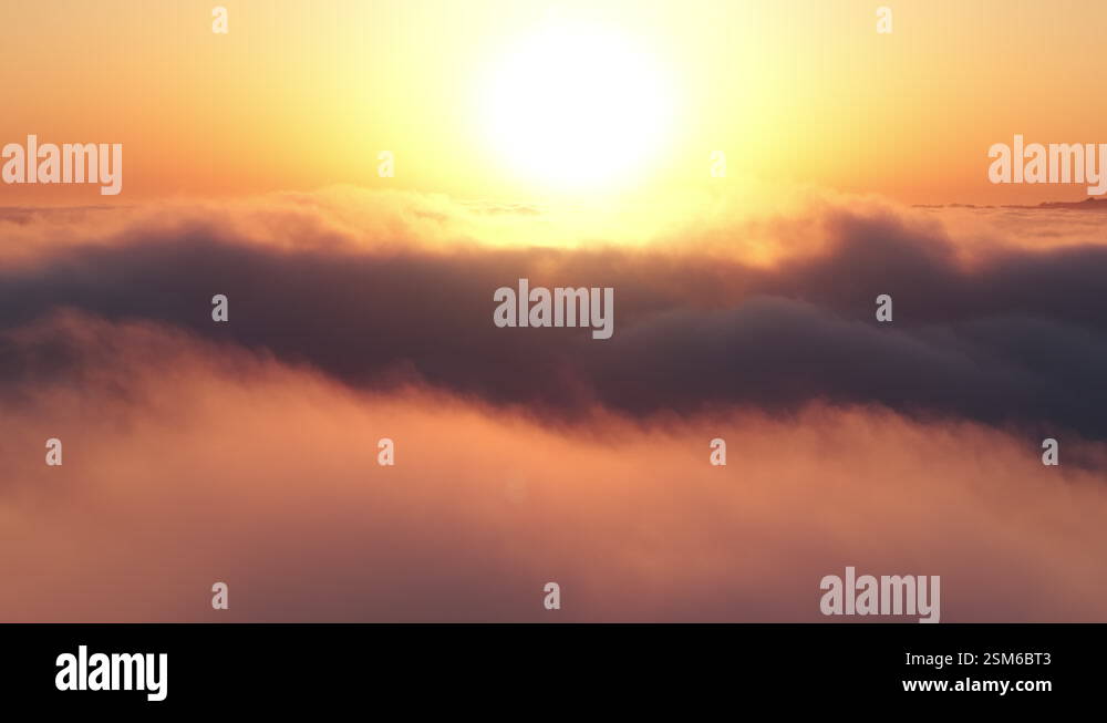 Camera raising above from thick fog above breathtaking clouds at golden ...