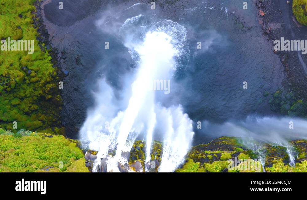 top-down shot overhead the Seljalandsfoss waterfall flowing and ...