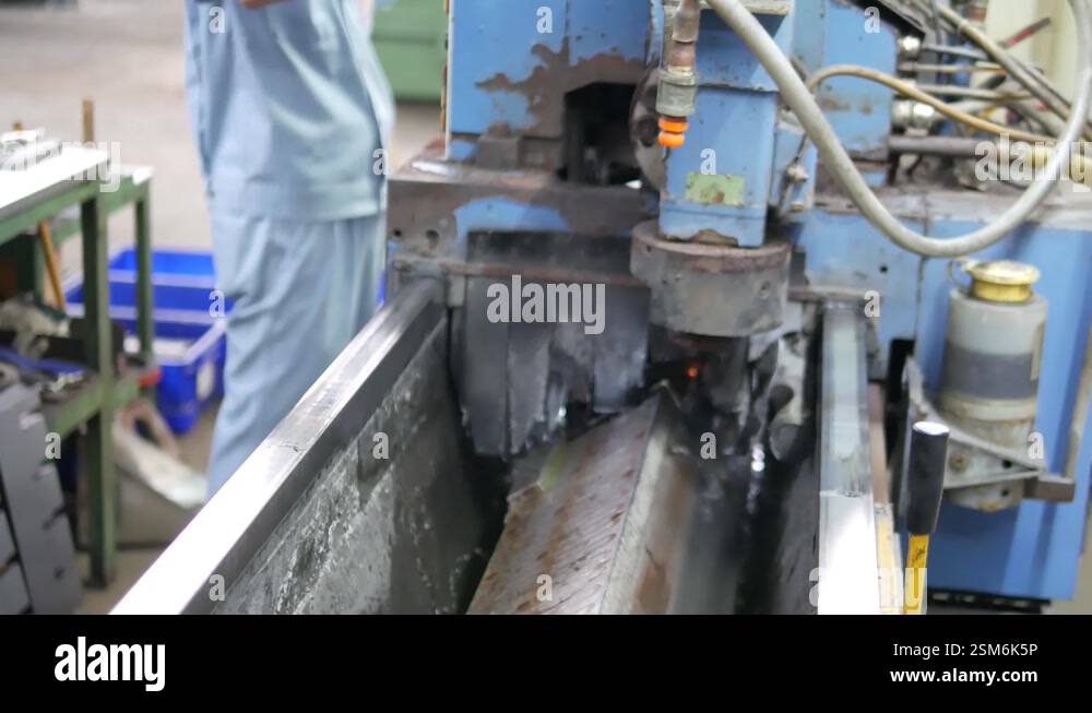 Machine Putting Oil on Metal Blade in Factory Stock Video Footage - Alamy