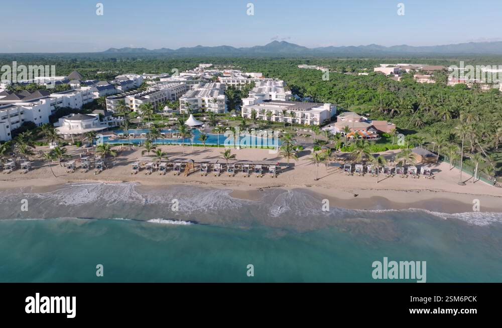 Cinematic aerial view showing hotel resort in scenic landscape on Stock ...
