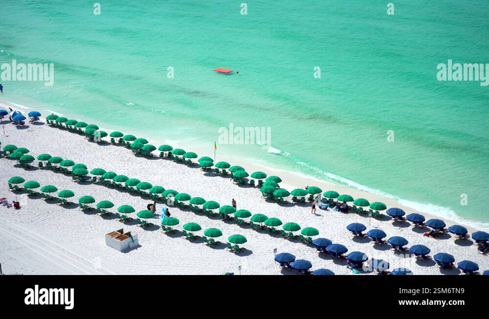Florida Beach Aerial chair and colorful umbrella beach service. Miami ...