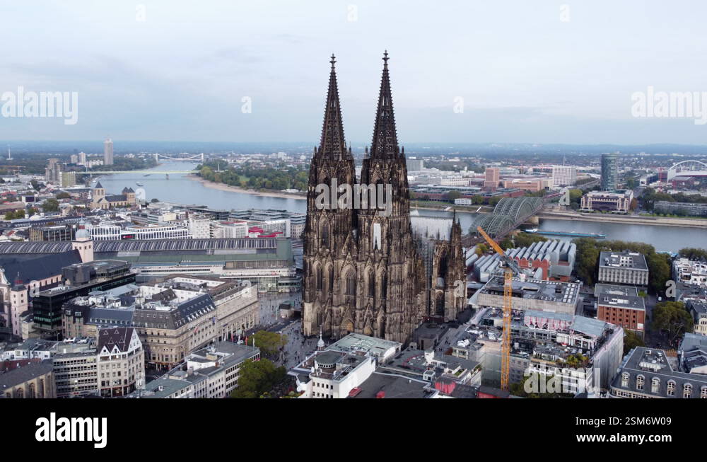 Ornate twin-spires of famous German landmark, Cologne Cathedral church ...