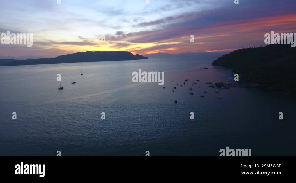 Panning over the calm waters of Ballena Bay Costa Rica during a ...