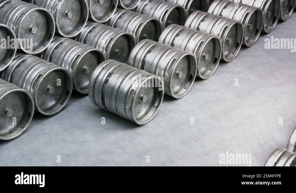 Multiple metal beer kegs stacked on the ground in endless, seamless ...