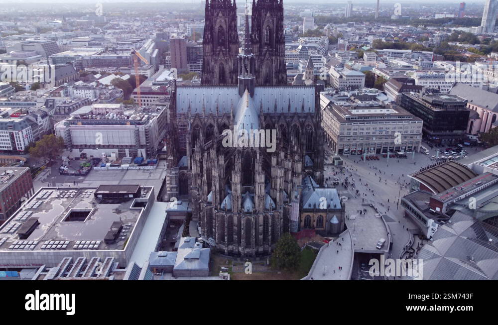 Tilt-up Reveal Of Cologne Cathedral Twin Spires From Apse Side Exterior ...