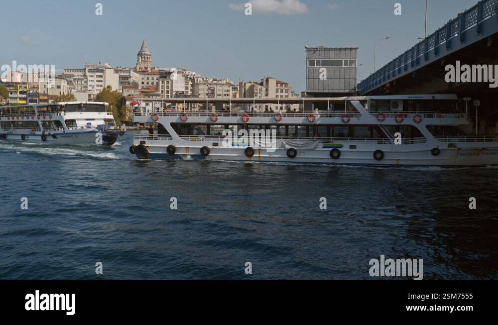 Double decked ferry passenger cruise boats sail low clearance Galata ...