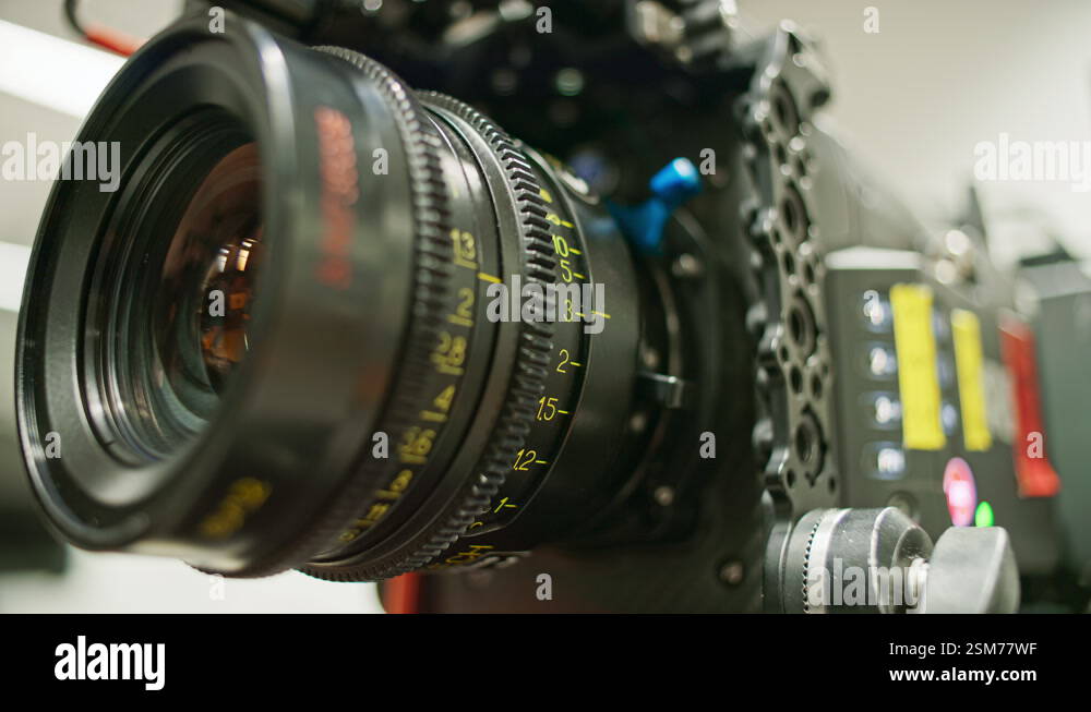 Focus ring of a professional cinema camera turning, focus distance ...