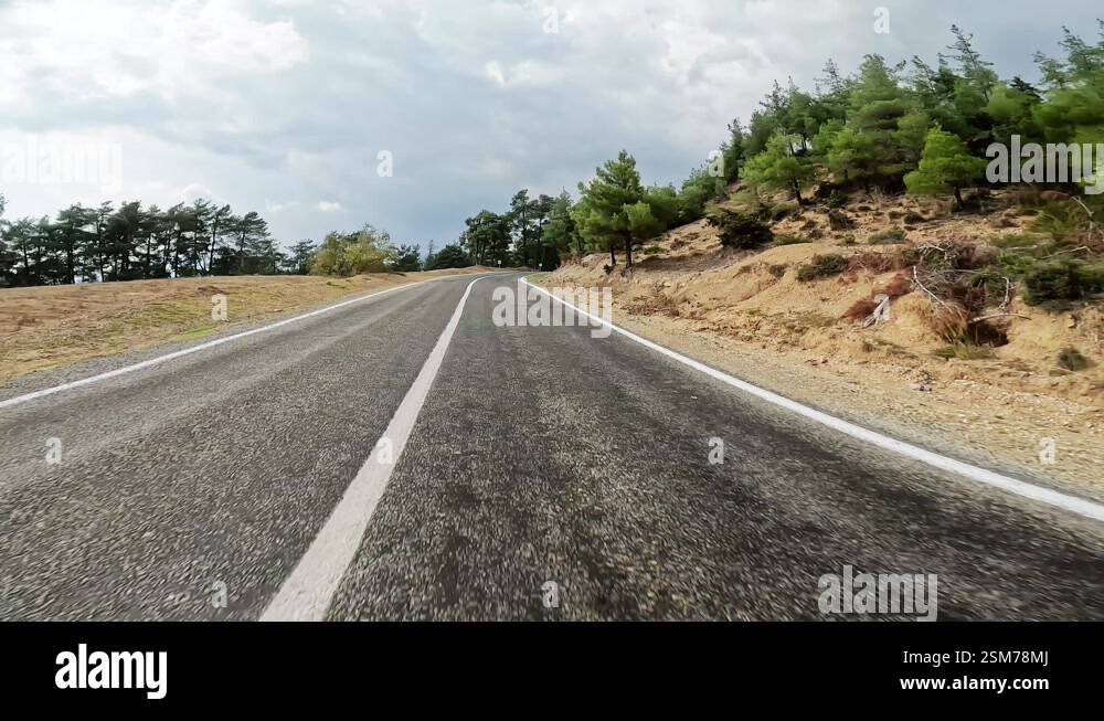 Road trip by car along the mountain roads and serpentines on sanset of ...