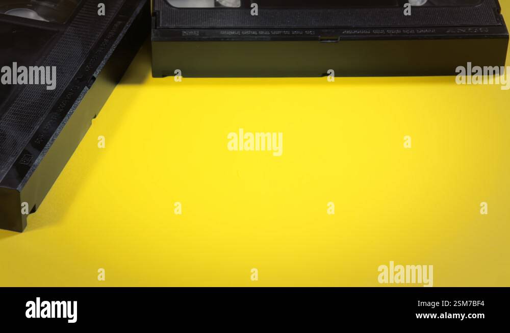 Picking a vintage VHS videotape, complete with handwritten 1980's Stock ...