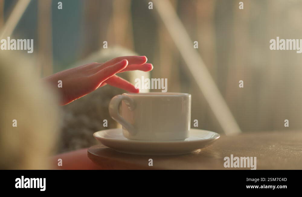 Child move finger along rim of cup sitting at table Stock Video Footage ...