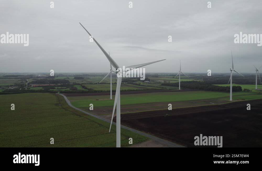 Large Windmill Farm on Field. Wind Turbines, Renewable Energy, Wind ...