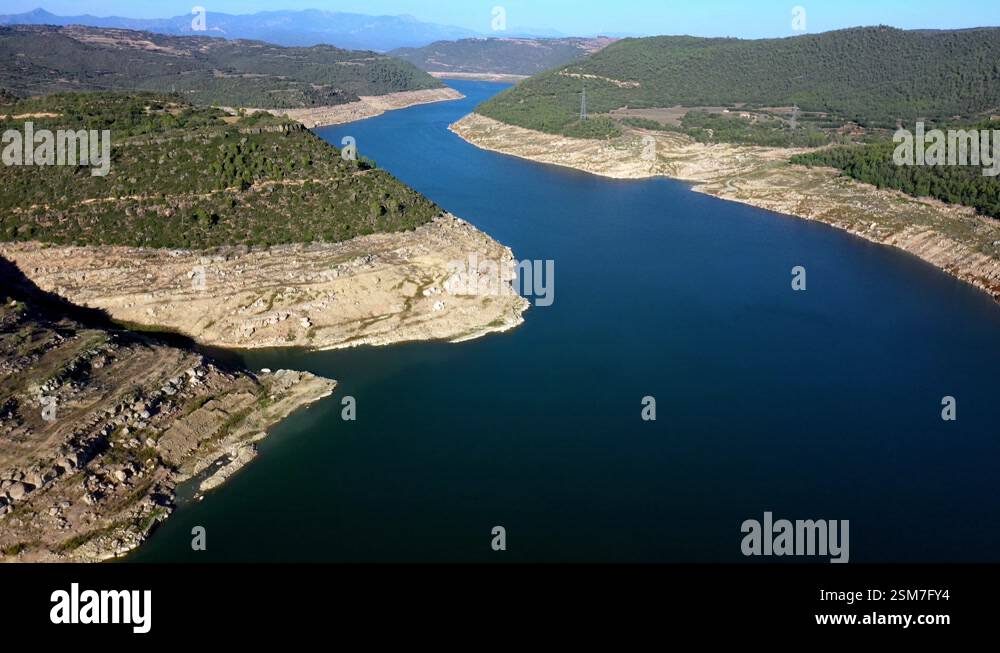Man-made Lake, Hydroelectric Dam Reservoir, Aerial Tilt Up Reveal Stock ...