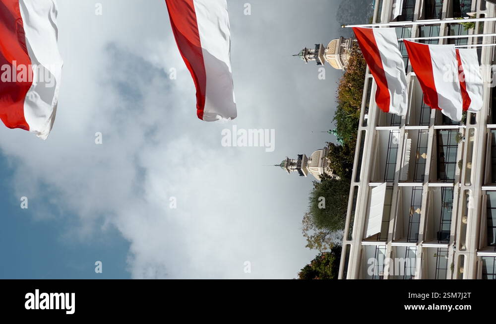 Flags of principality of Monaco in the wind at sunny weather Stock ...