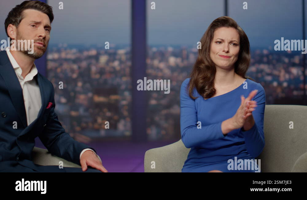 Anchor woman supporting man guest telling sad life story in tv show ...