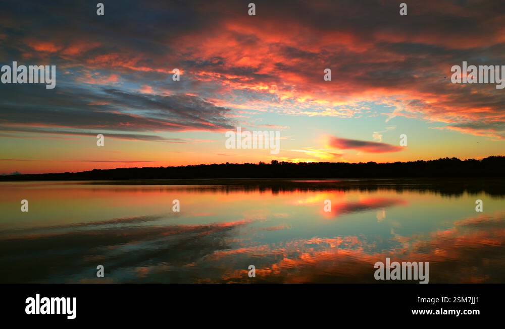 Amazing dawn sky mirrored in Stock Videos & Footage - HD and 4K Video ...