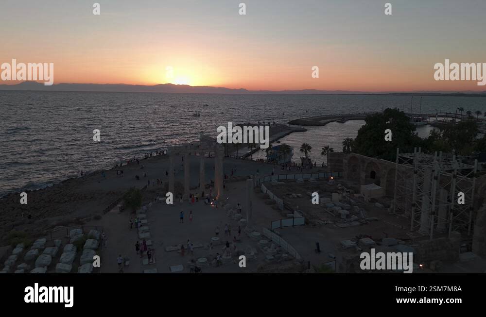 Side harbour waterfront aerial view circling old town and Apollon ...
