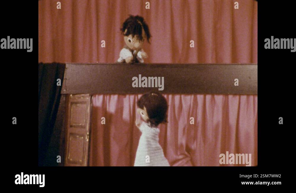 1970s: Puppet talks other puppet from floor above them. Puppet reads ...