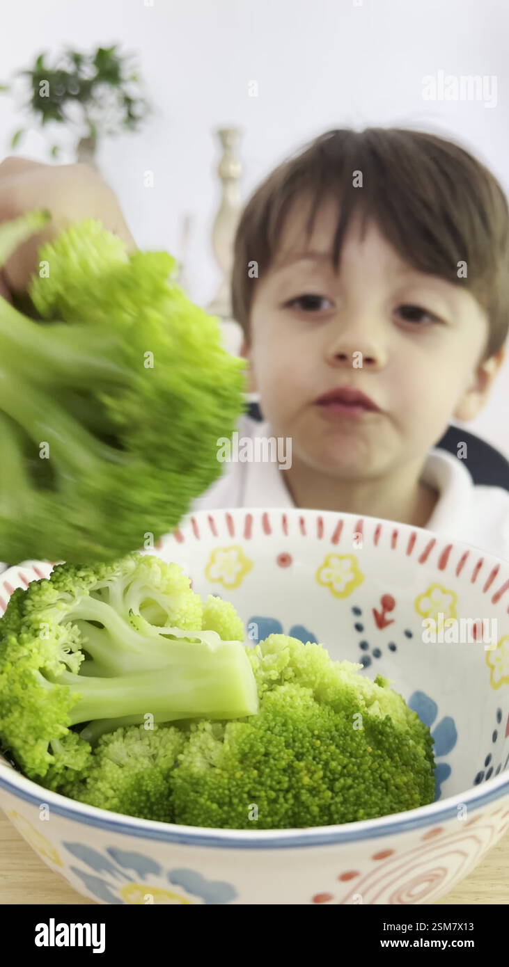 Selective Young Boy Choosing Broccoli to Eat with His Hands Stock Video ...