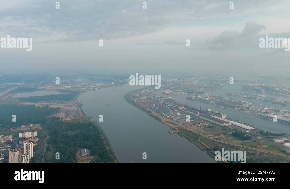 Antwerp, Belgium. River Scheldt (Escaut) port infrastructure with docks ...