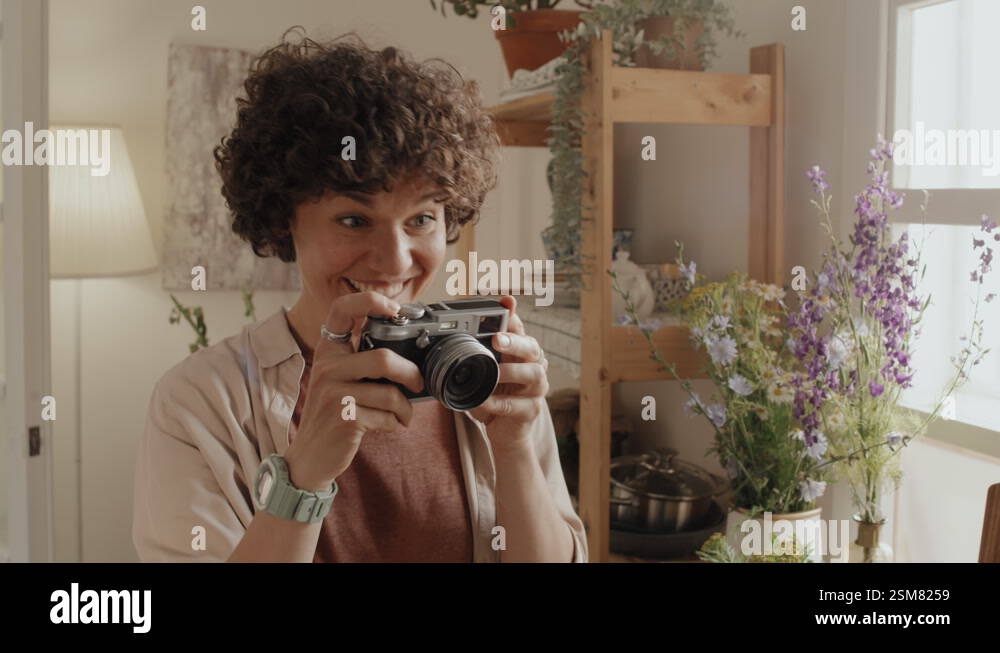 Woman Taking Photos Of Her Family Stock Video Footage - Alamy