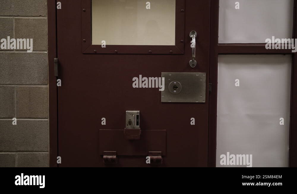 Prison cell door inside of jail or prison hallway Stock Video Footage ...