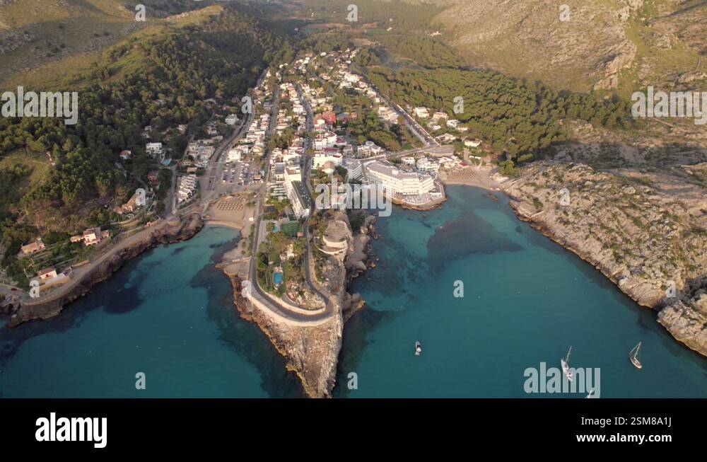 4k drone. Cala Sant Vicenç is a small resort town in north-eastern ...