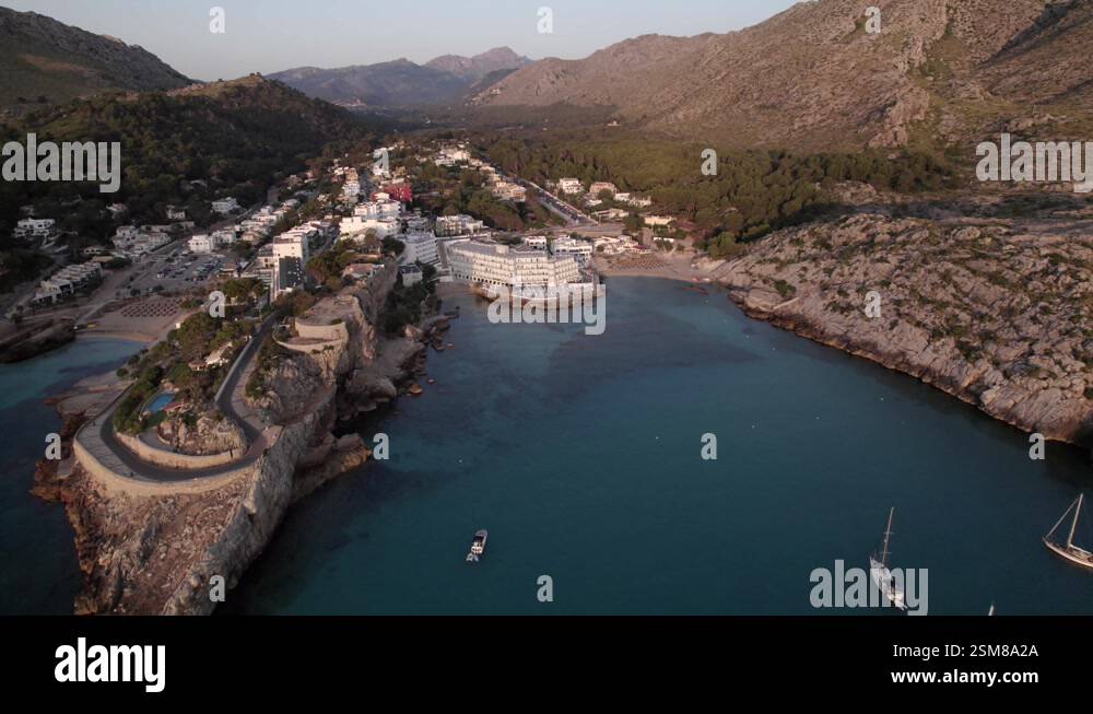 4k drone. Cala Sant Vicenç is a small resort town in north-eastern ...