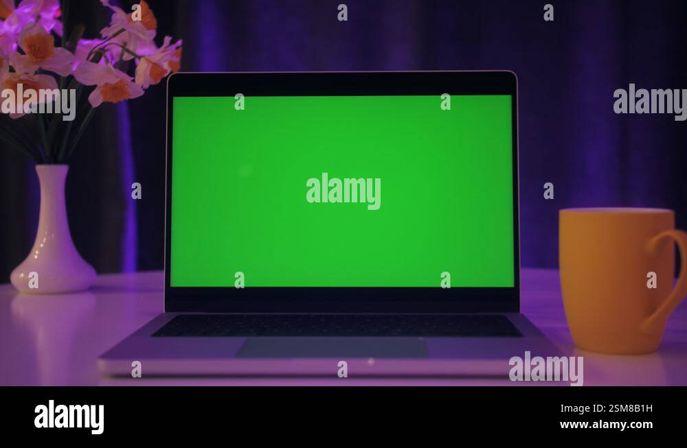 Close up shot of modern chroma key green screen laptop computer set up ...