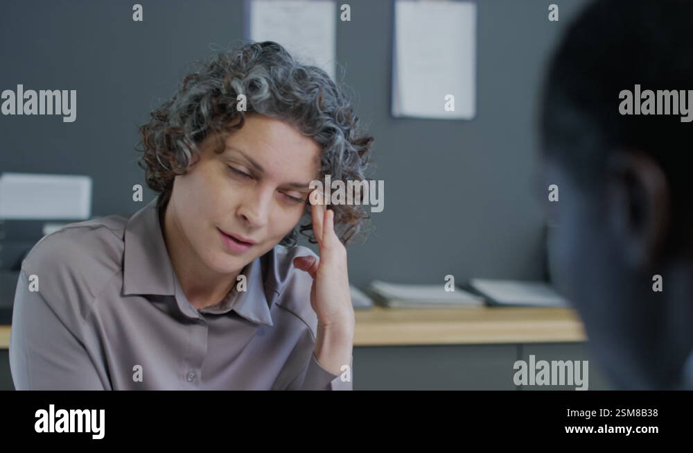 Female Patient Complaining About Severe Headache to Doctor Stock Video ...